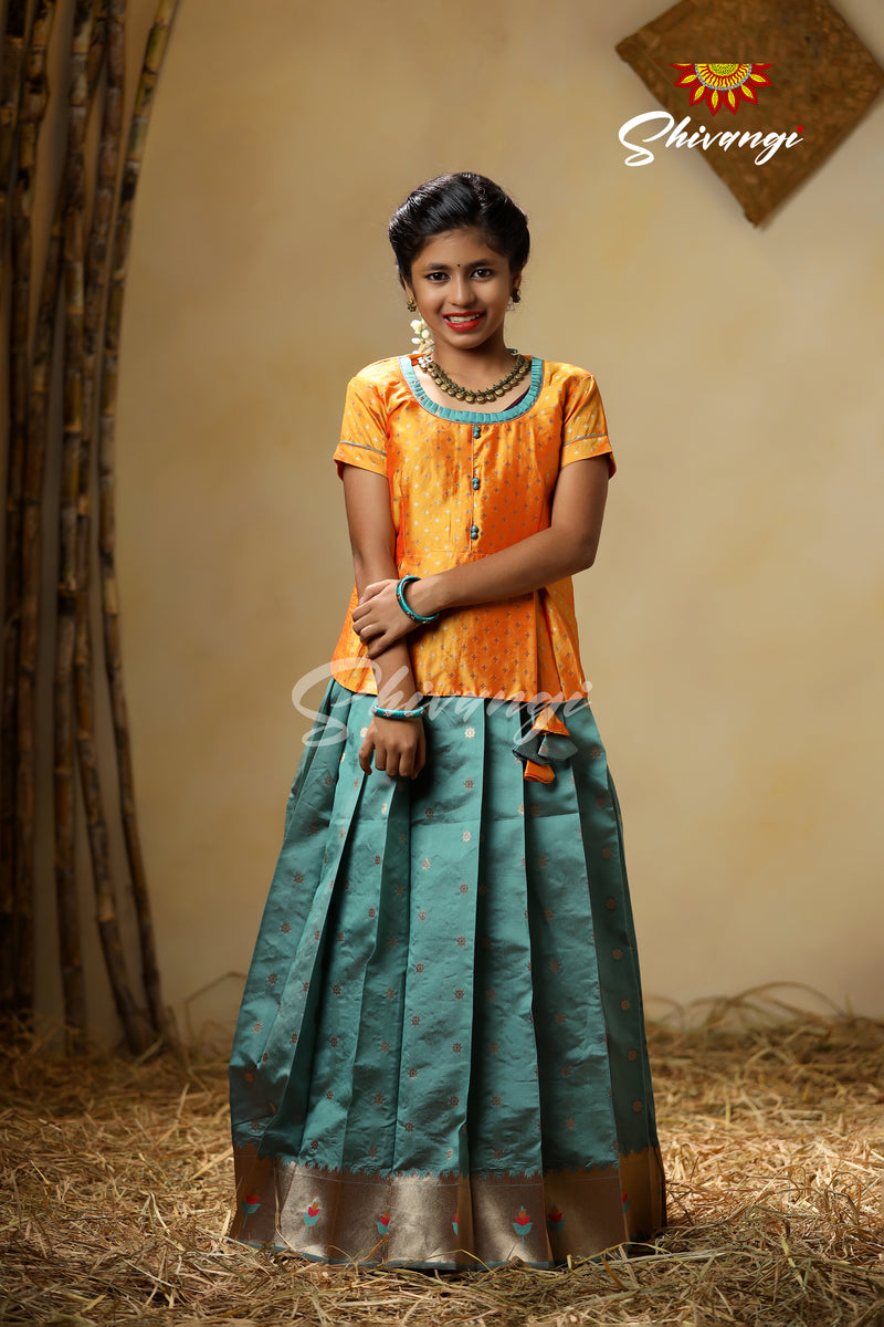 Pattu Pavadai designs in Semi Silk in Green - Pepper Flower